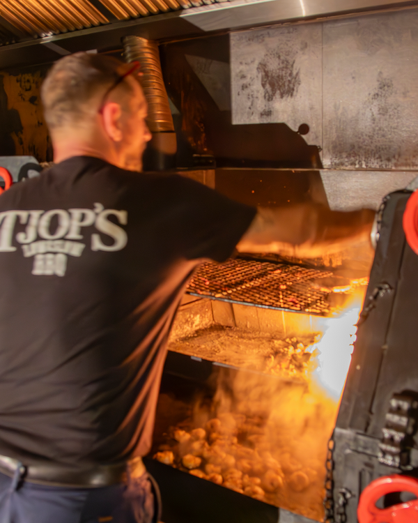 Over Tjop's | Tjop's